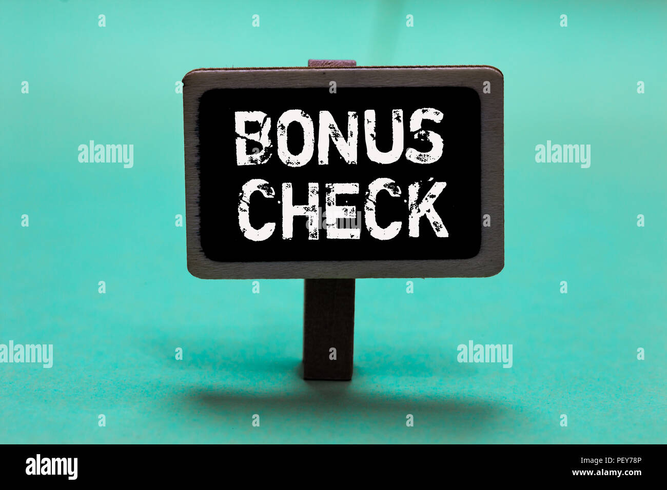Text sign showing Bonus Check. Conceptual photo something in addition ...