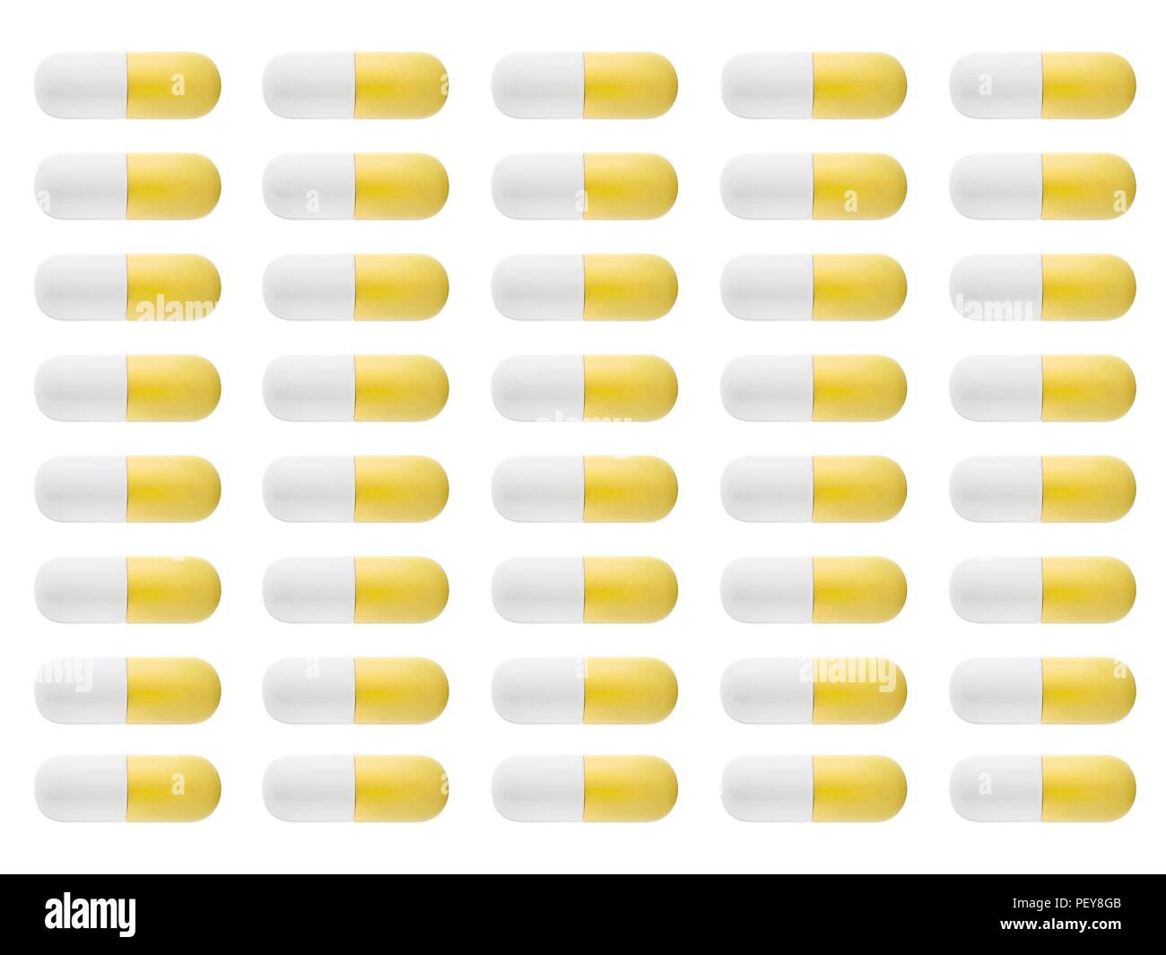 Yellow white pill capsule hi-res stock photography and images - Alamy