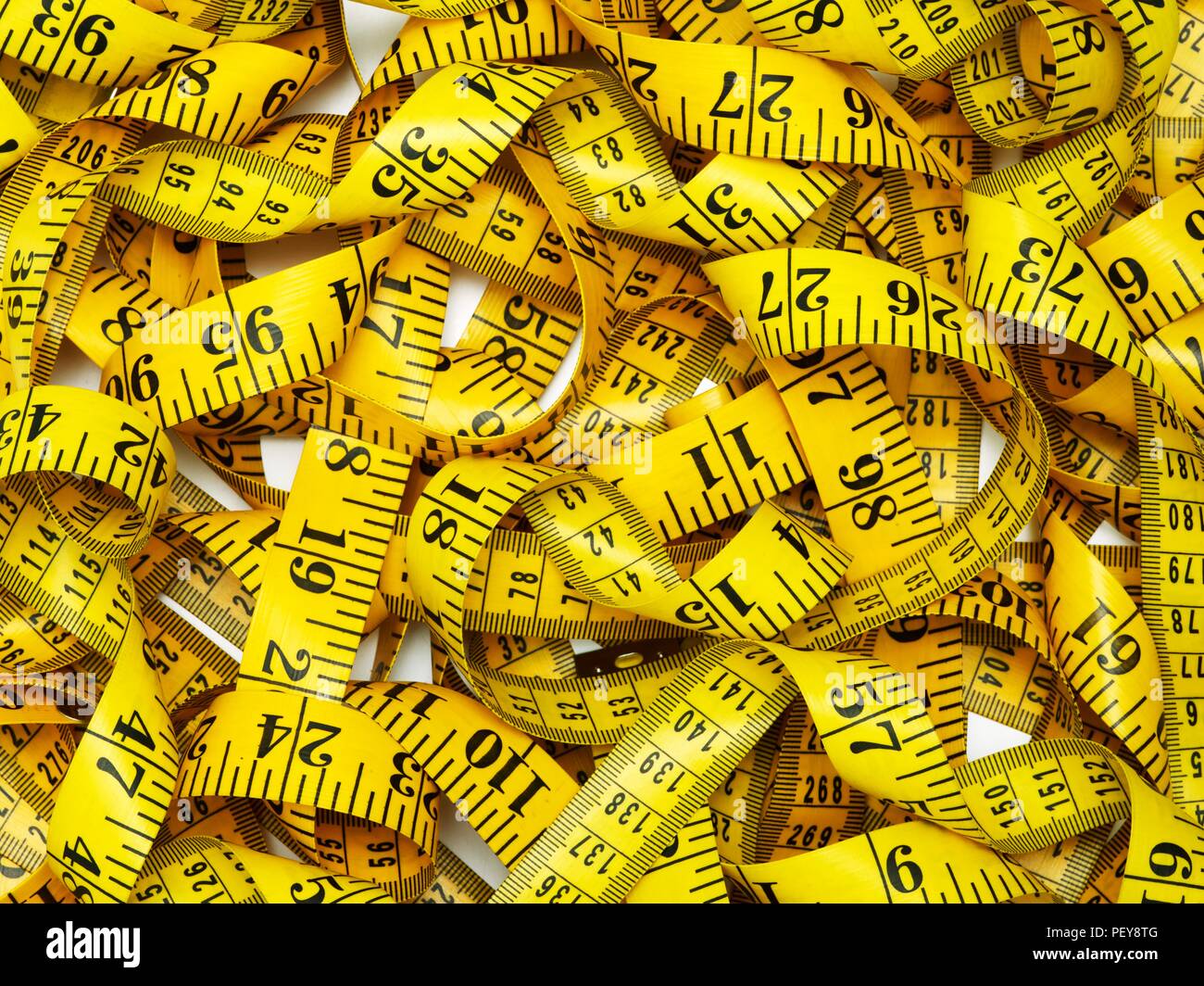 Measuring tape, full frame Stock Photo - Alamy
