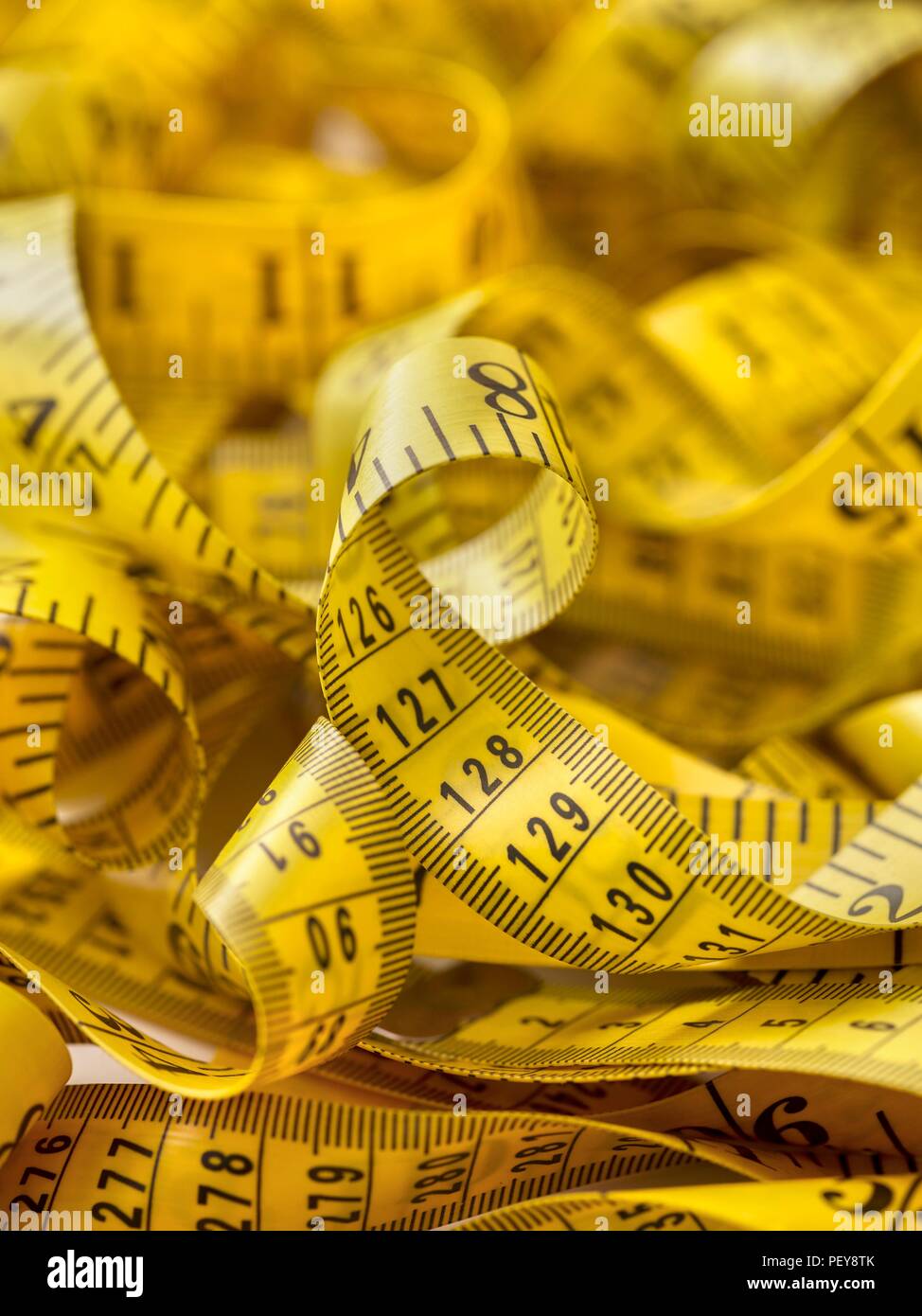 Measuring tape, full frame Stock Photo - Alamy