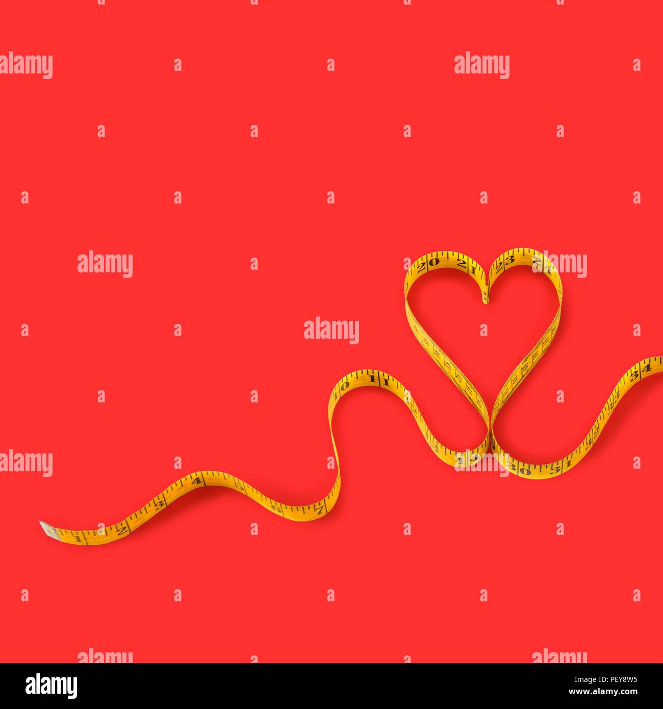 Measuring tape in the shape of a heart Stock Photo - Alamy