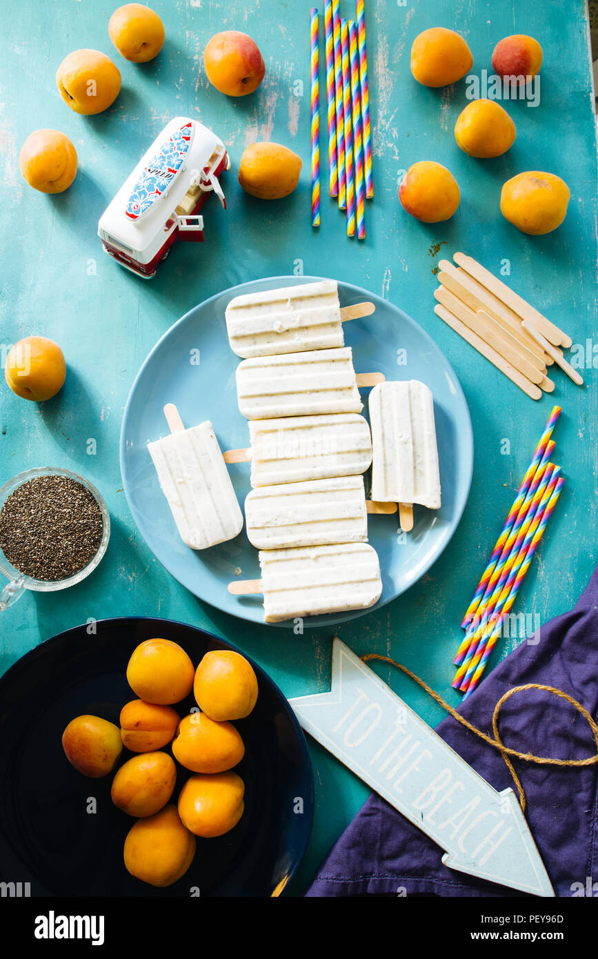 Popsicle, summertime concept, bunch of lemon, apricot and chia seeds ...
