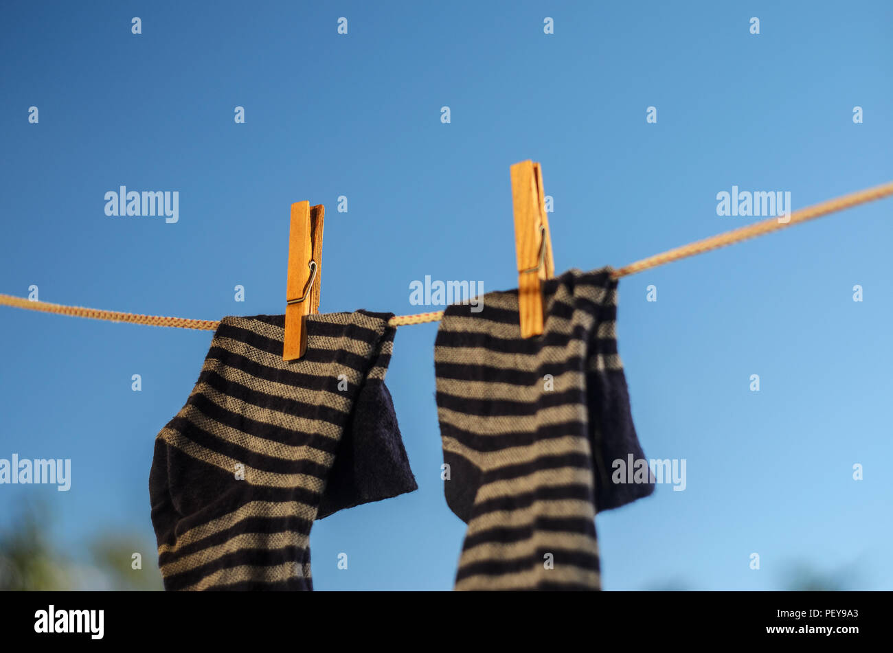 Vintage socks on the line hi-res stock photography and images - Alamy