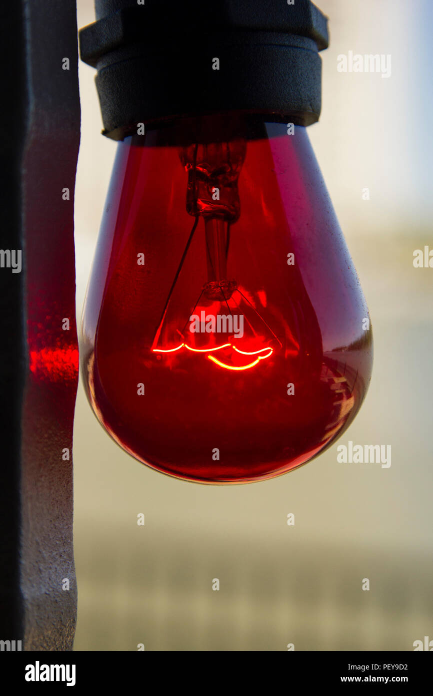 Red colored lightbulb Stock Photo - Alamy