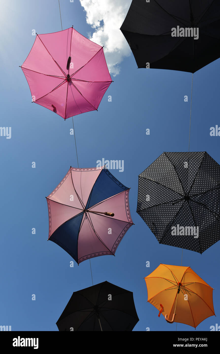 Flying umbrella hi-res stock photography and images - Alamy