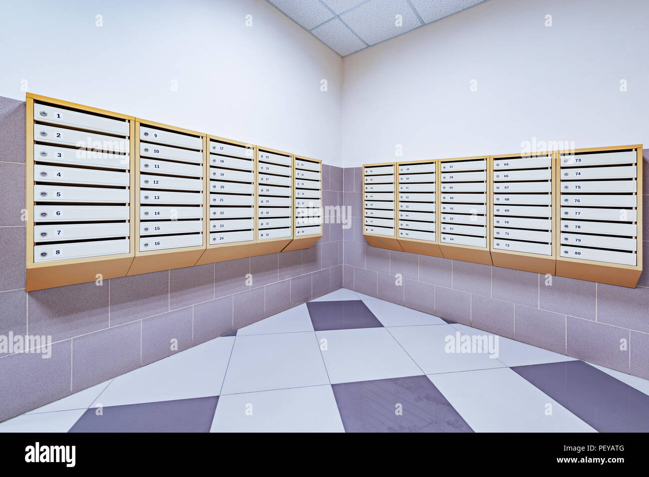 Post boxes inside of the apartment house Stock Photo - Alamy