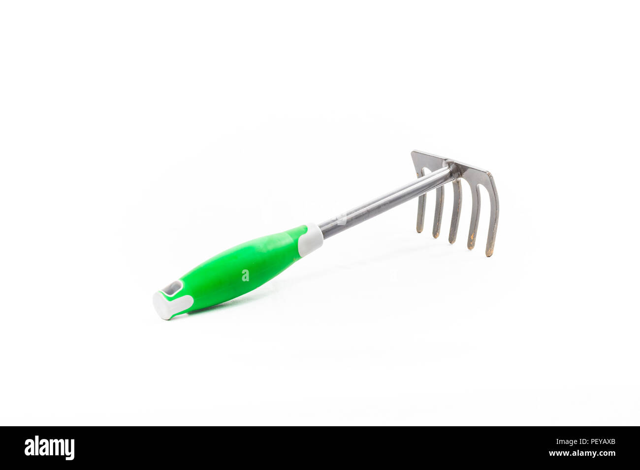 small rake gardening 5 teeth with green handle on white background ...