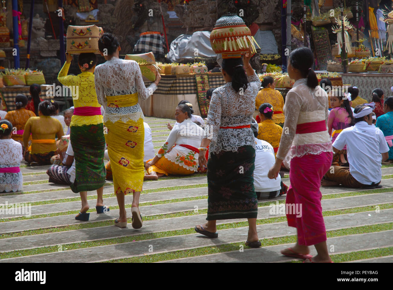 Women carrying offerings on their heads, Pura Dalem, Hindu temple in ...