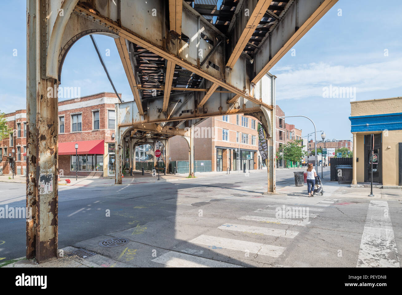 Street scene under the elevated train in the Lakeview neighborhood ...