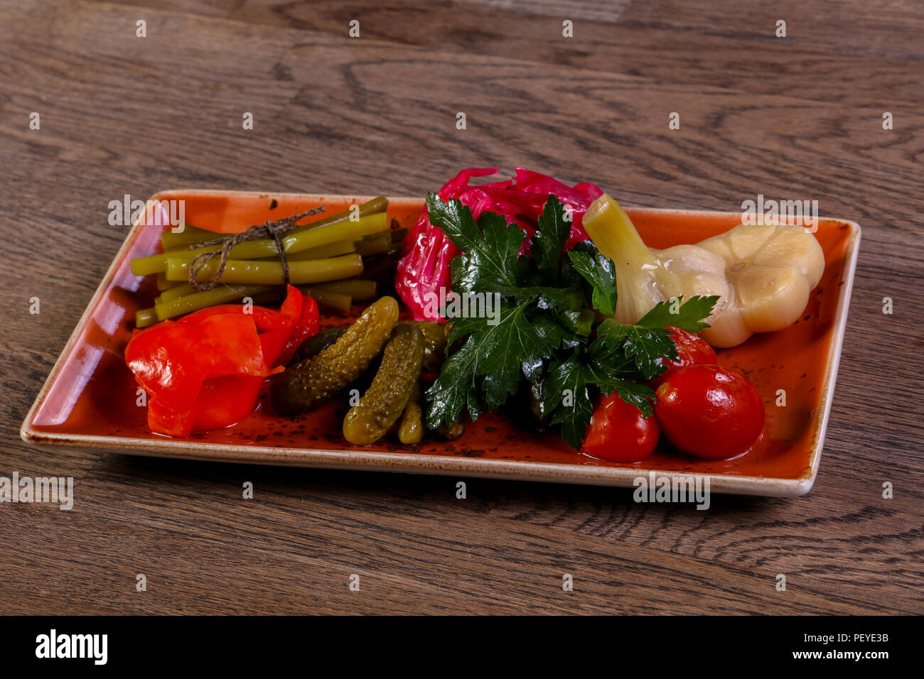 Pickled vegetables plate mix with parsley Stock Photo - Alamy
