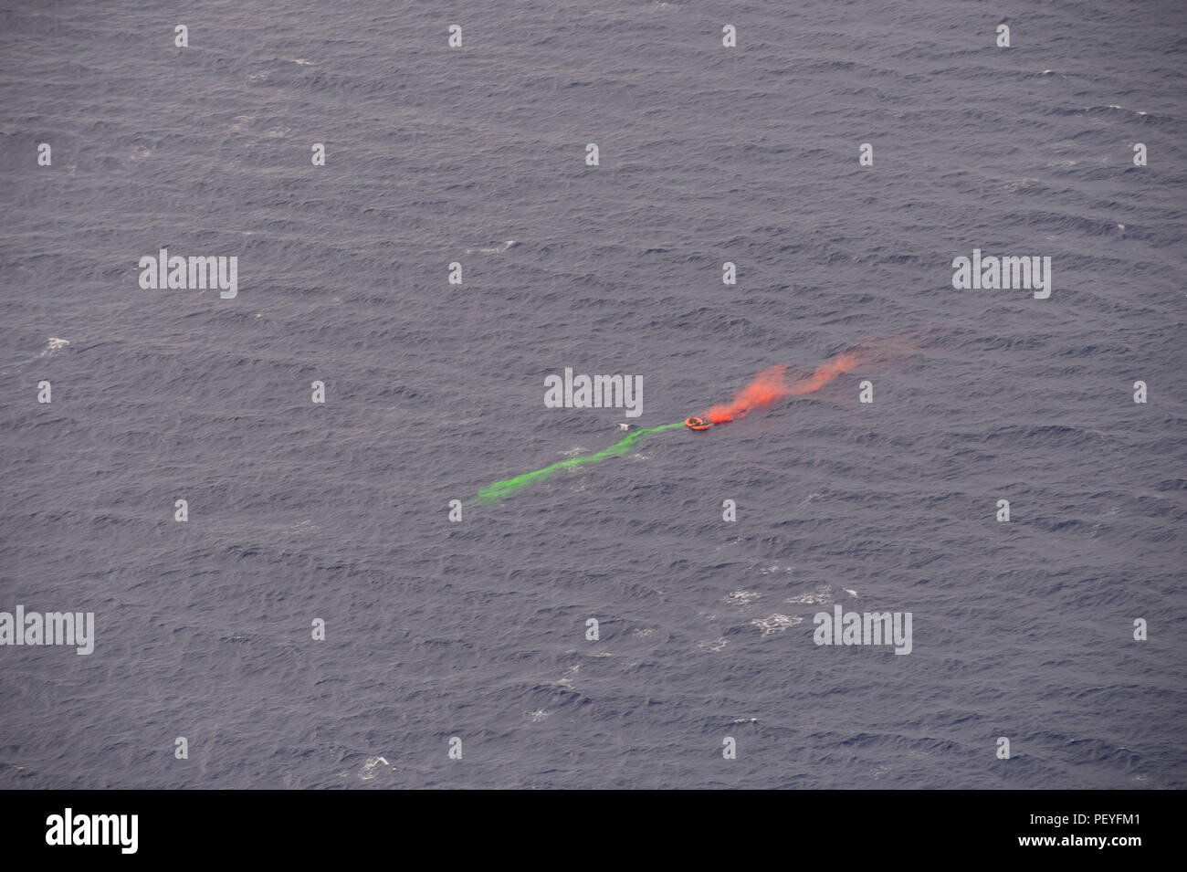 U.S. Airmen drift in a life raft while awaiting retrieval as part of ...