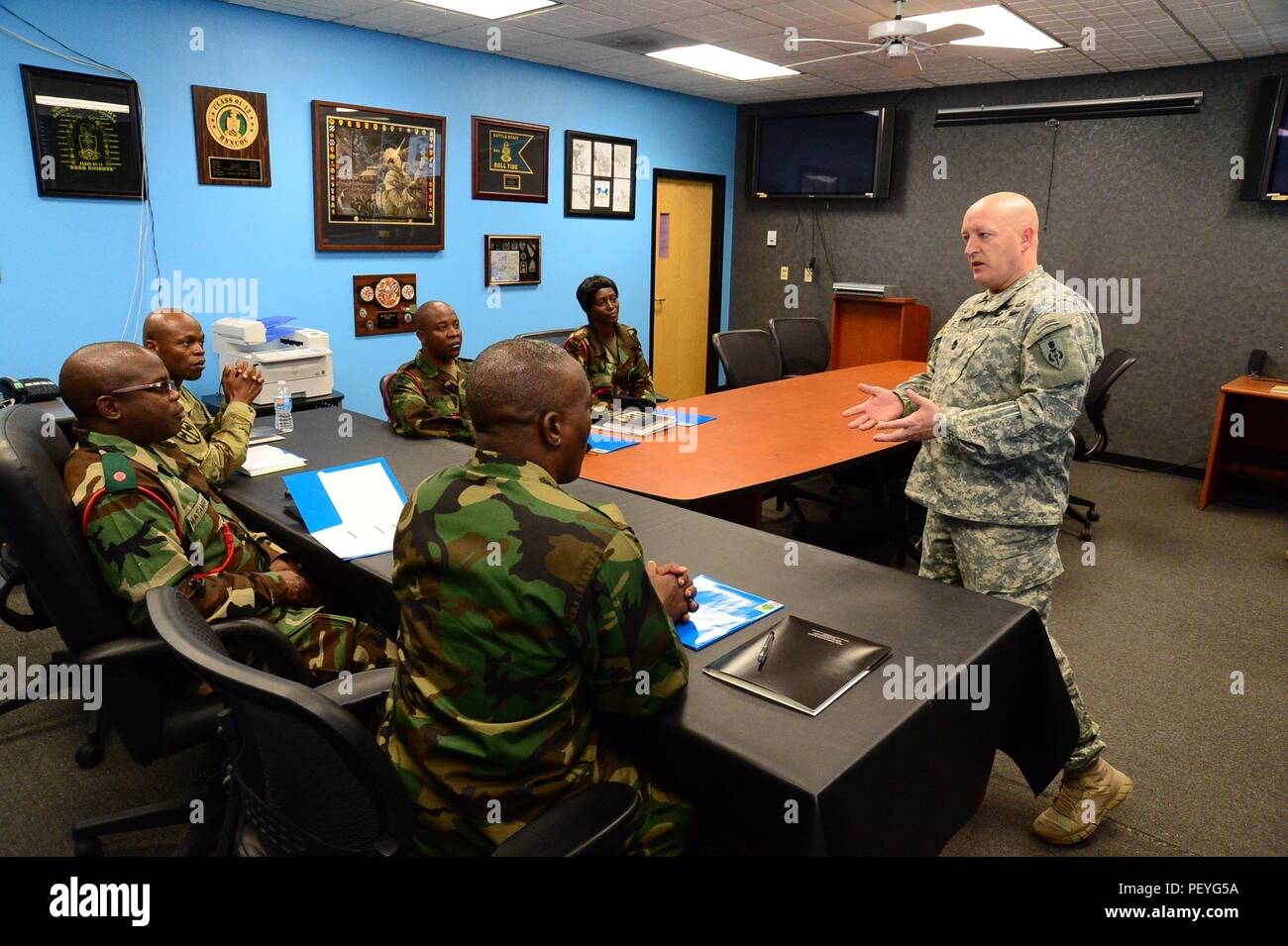 Sgt. Maj. Richard L. Tucker (standing), director of the Battle Staff ...
