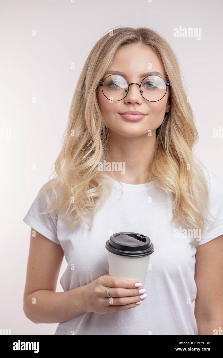 an awesome student is drinking coffe while noon recess Stock Photo - Alamy