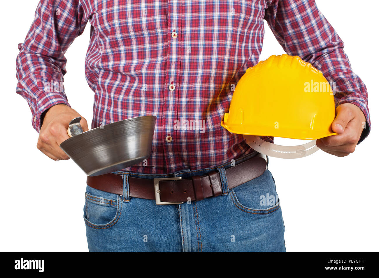 Close up picture of young engineer holding a yellow hard hat and ...
