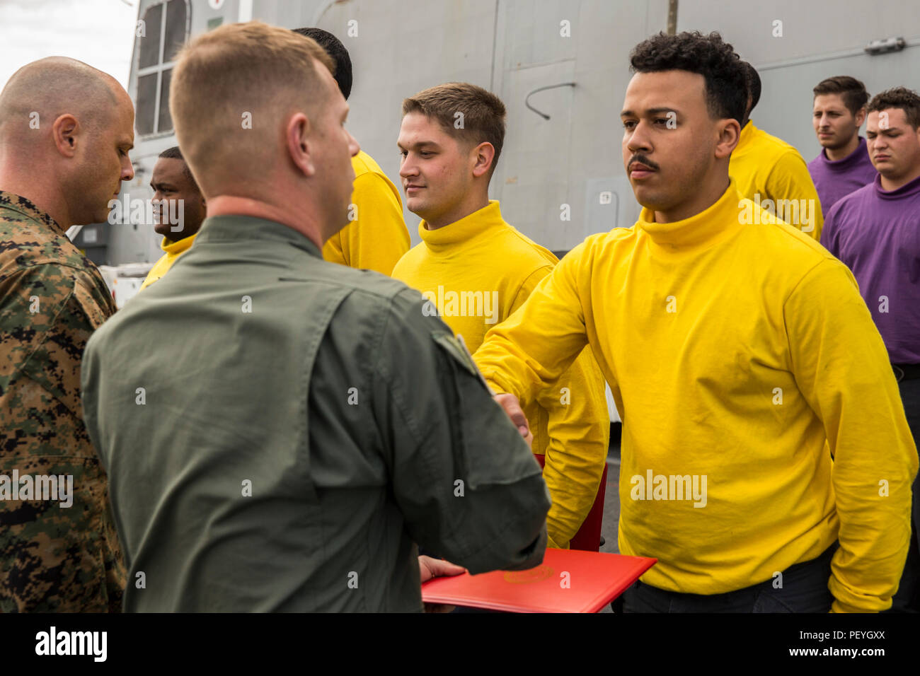 Seaman Abhan L. Hogan, an airman with the Boxer Amphibious Ready Group ...