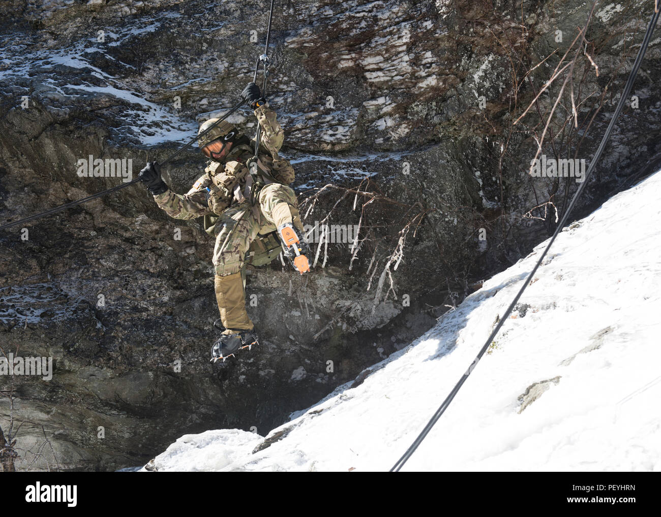 A U.S. Army Soldier rappels a cliff face on Smugglers’ Notch in ...
