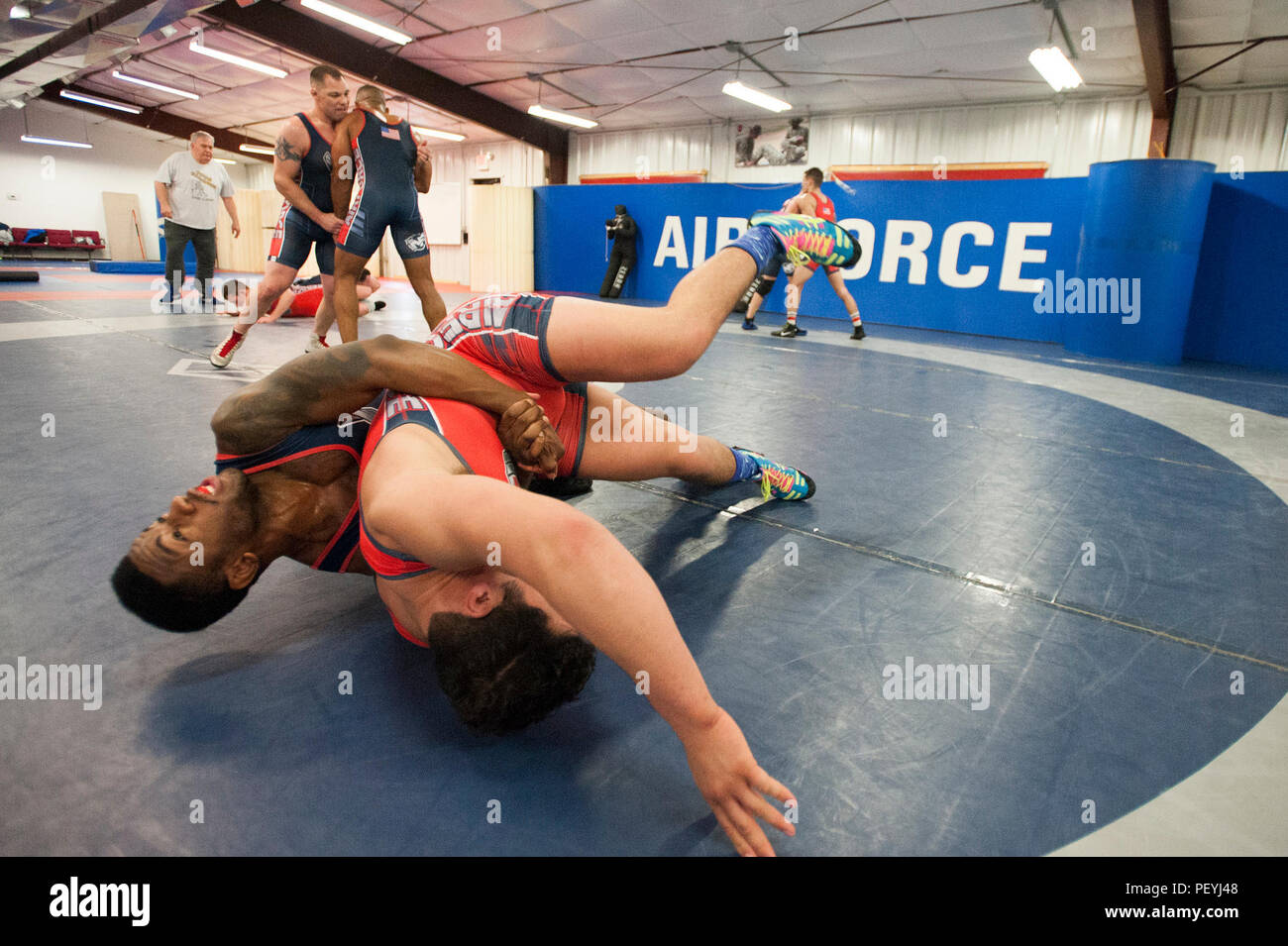 Senior Airman Brandon Johnson, Fairchild Air Force Base, Wash., flips ...