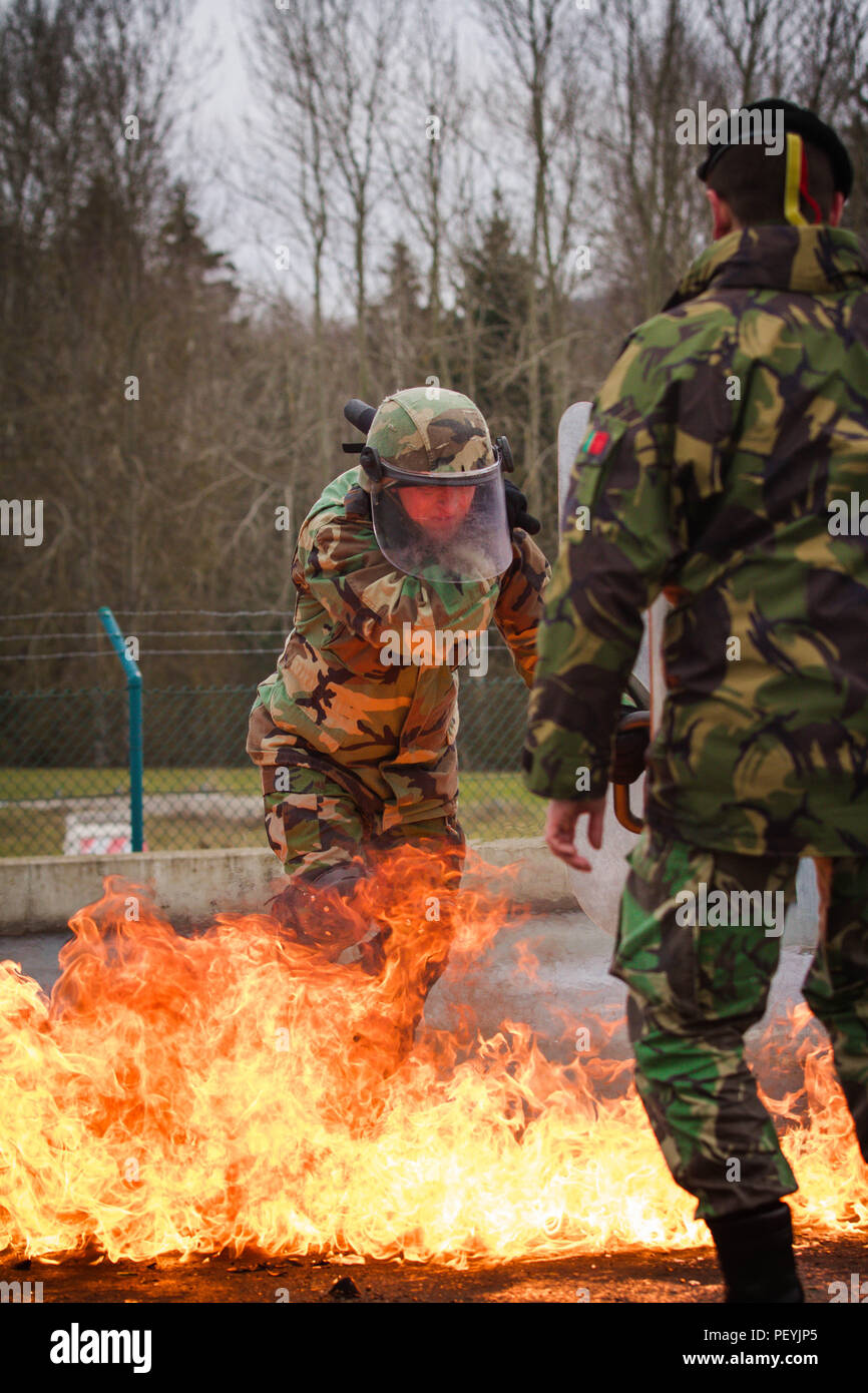 As his Portuguese Army trainers look on, a Moldavian soldier culminates ...