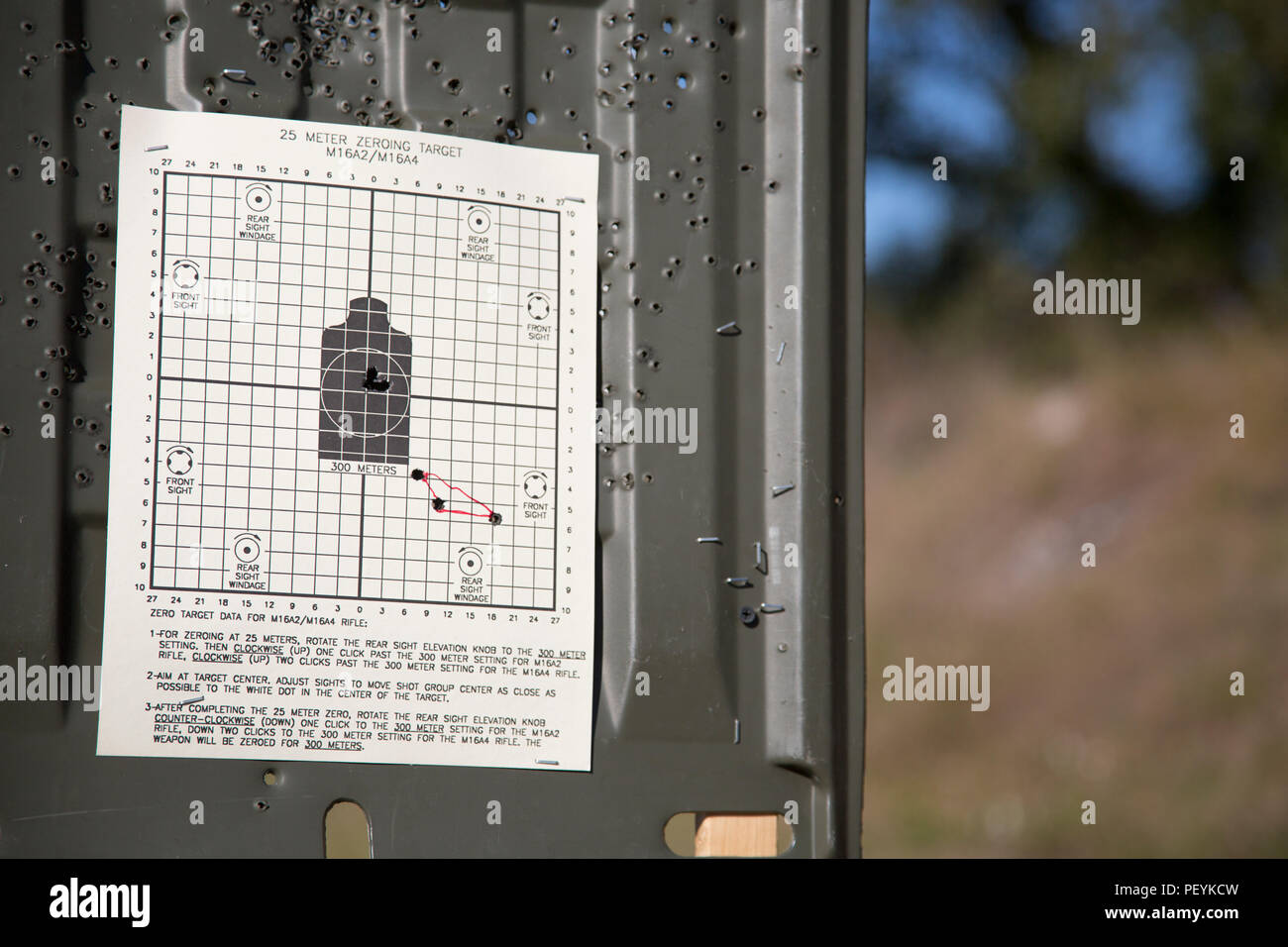 A M16A2 rifle paper target sits on display on a small arms range during ...