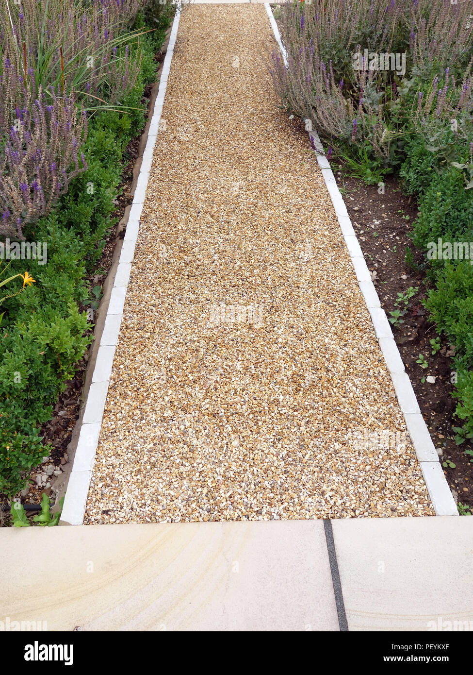 New natural stone slabs crossing well with fine gravel pathway hi-res ...