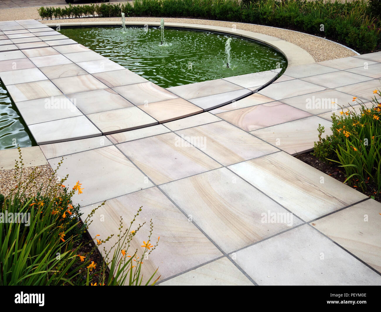Sharp clean cut stone slabs and various formal pathways & decorative ...