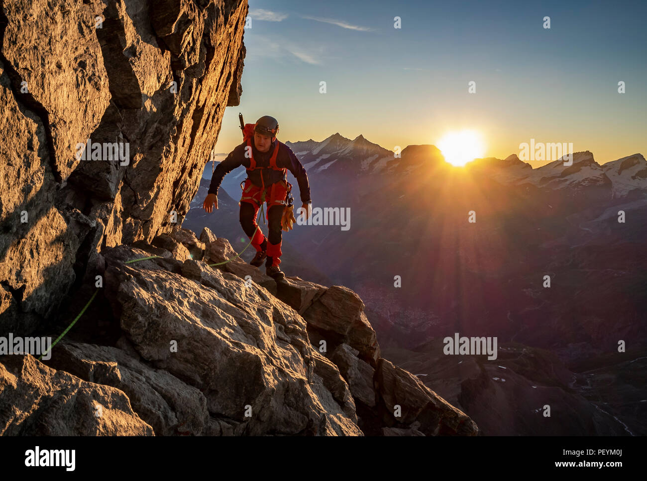 A climber on the Hornli Ridge of the Matterhorn Stock Photo - Alamy