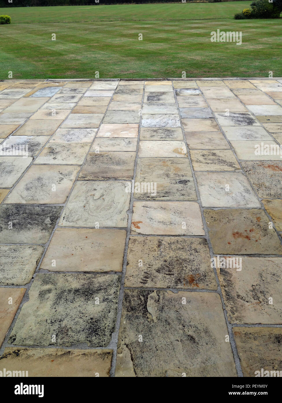 Large areas wonderful old real Yorkstone slabs in paved area ...