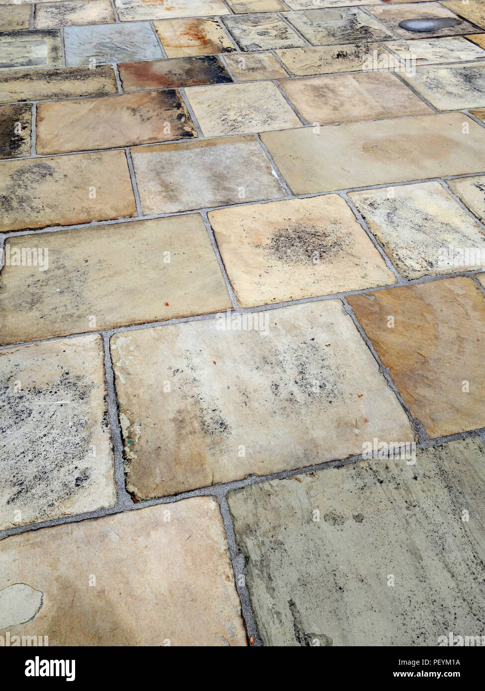 Large areas wonderful old real Yorkstone slabs in paved area around a ...