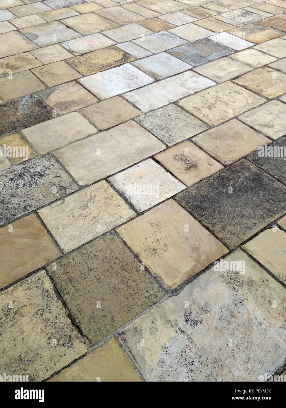 Large areas wonderful old real Yorkstone slabs in paved area around a ...