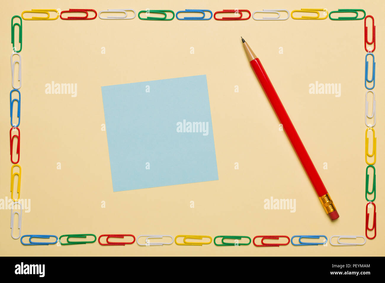 Note and pencil Stock Photo - Alamy
