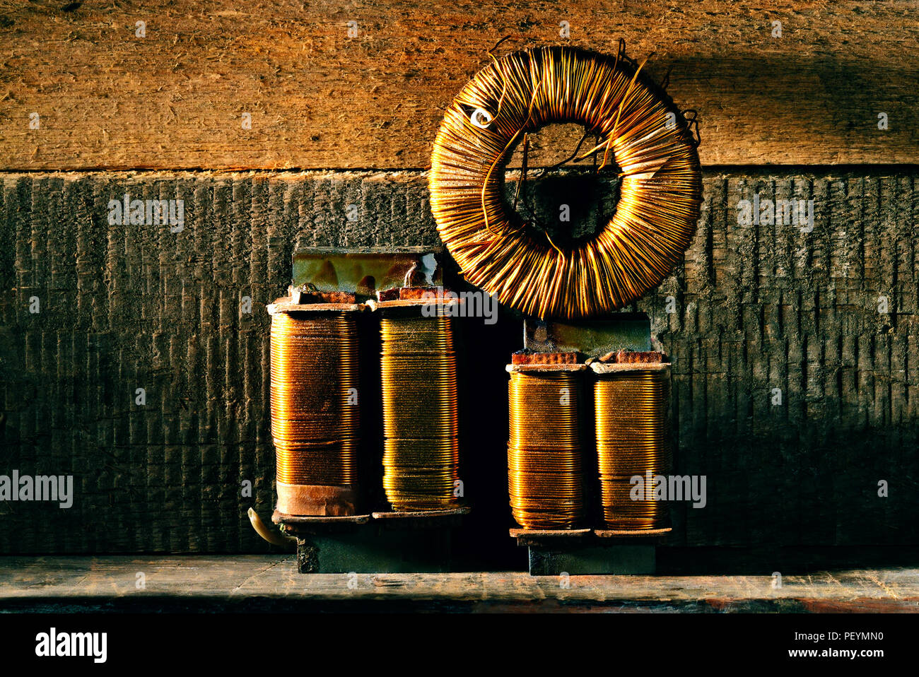 Three old copper wire coils Stock Photo - Alamy