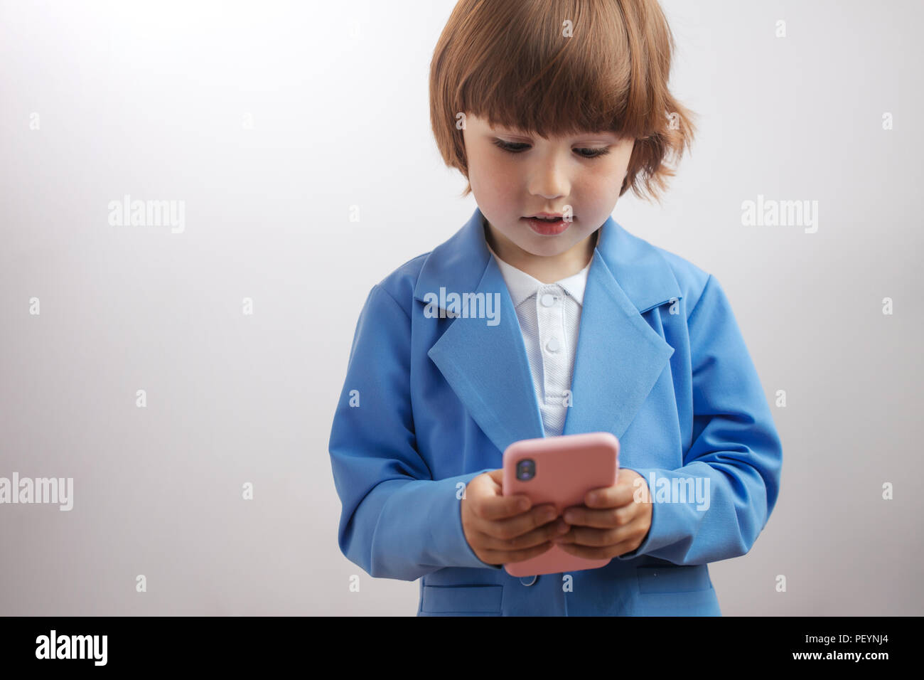 Child texting pictures hi-res stock photography and images - Alamy
