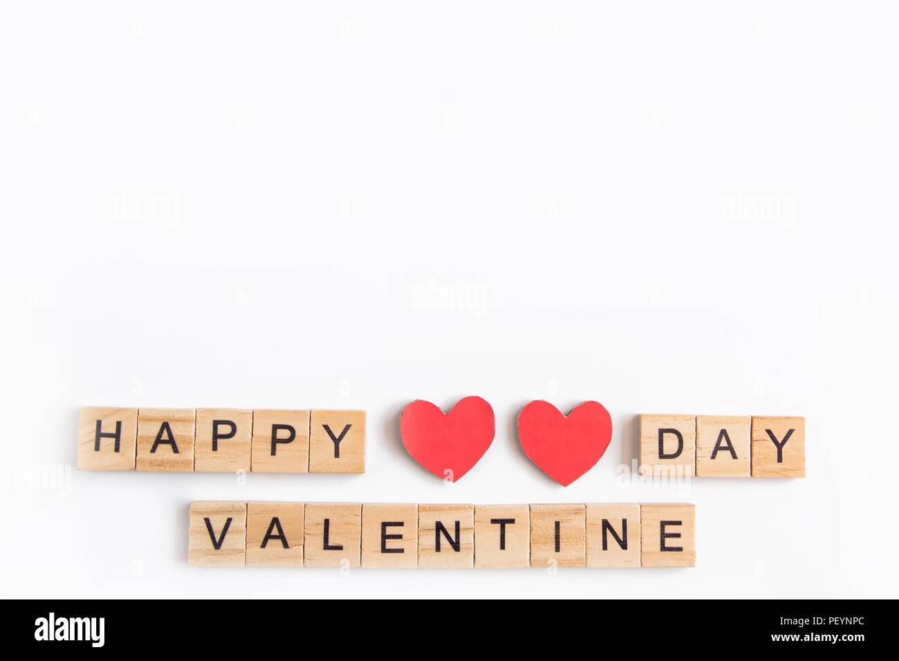 Alphabet letter wooden blocks tiles Valentine`s day on white background ...