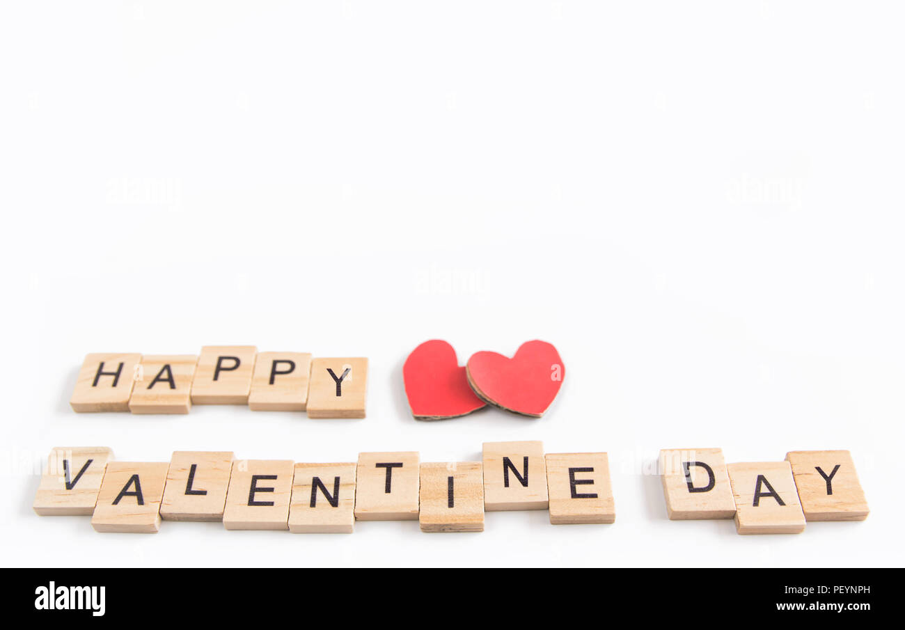 Alphabet letter wooden blocks tiles Valentine`s day on white background ...