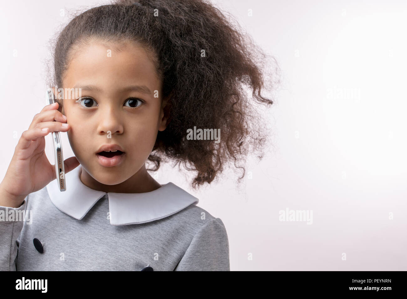 emotional little girl has heard something awful. copy space. isolated ...