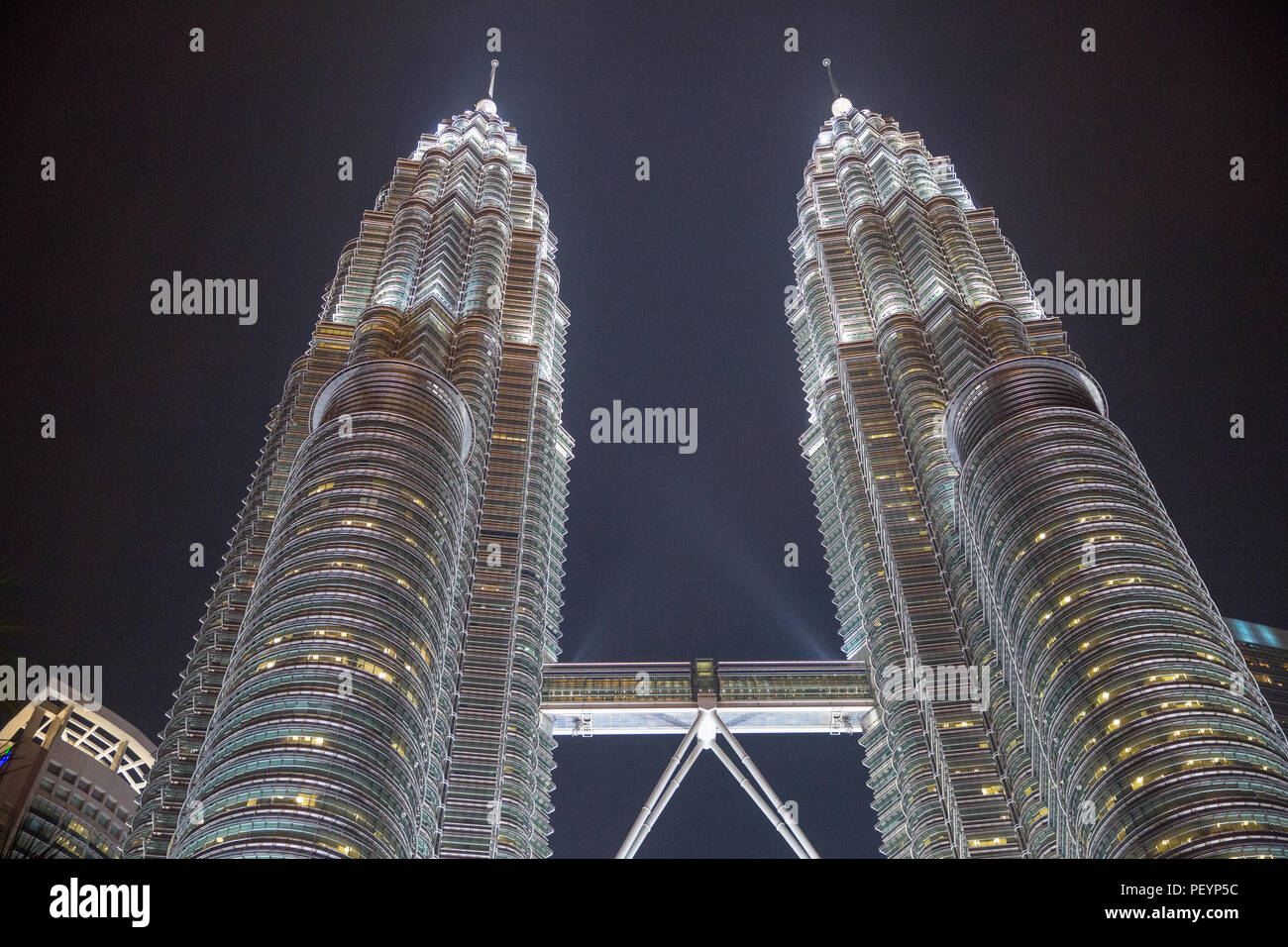 a big asia city by night to the sunrise with all the lights on the ...