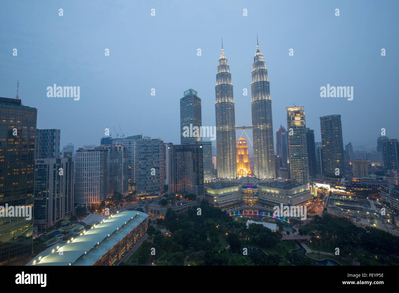 a big asia city by night to the sunrise with all the lights on the ...