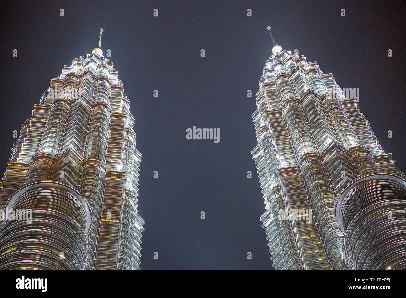 a big asia city by night to the sunrise with all the lights on the ...