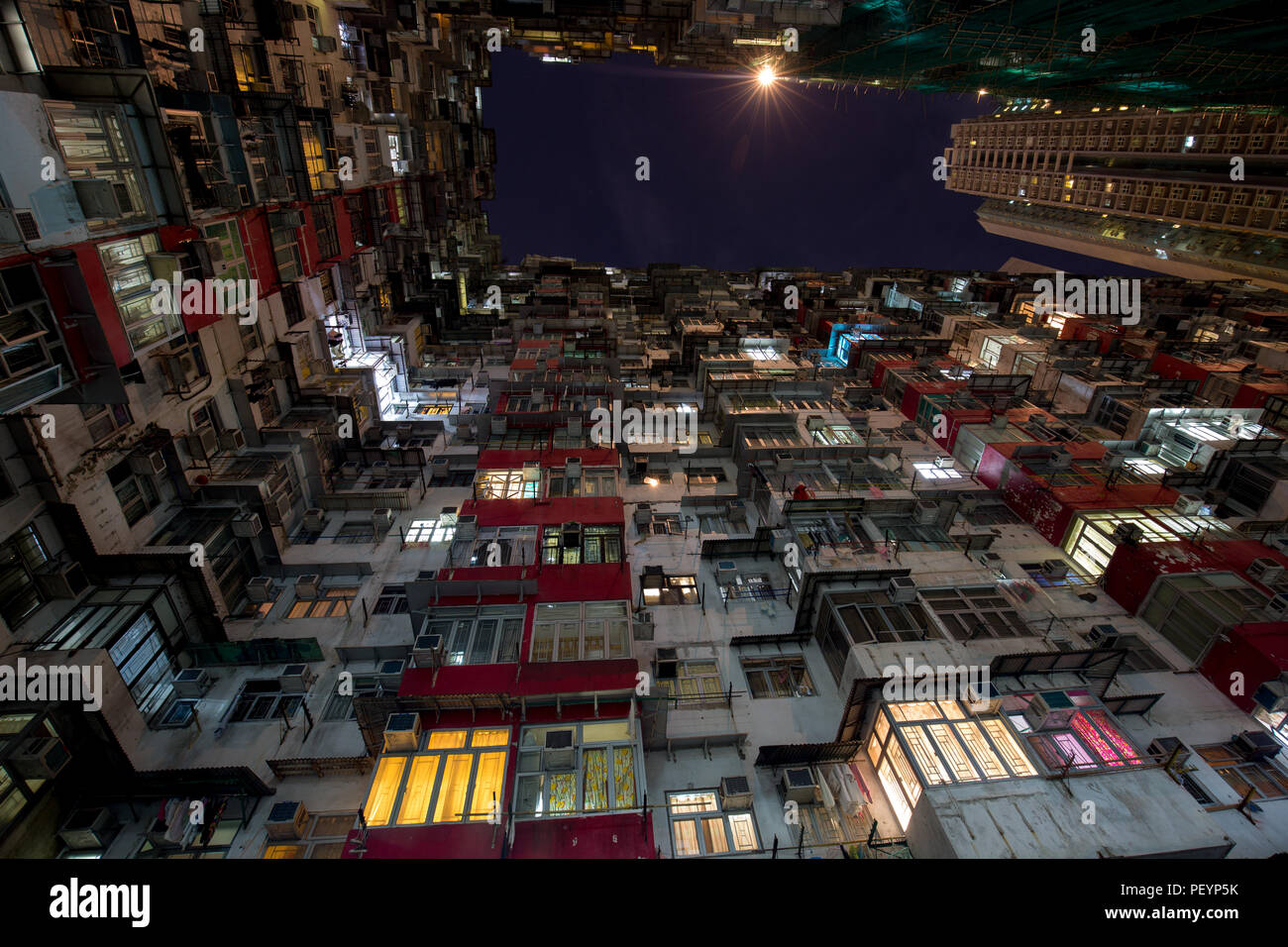 a big asia city by night to the sunrise with all the lights on the ...