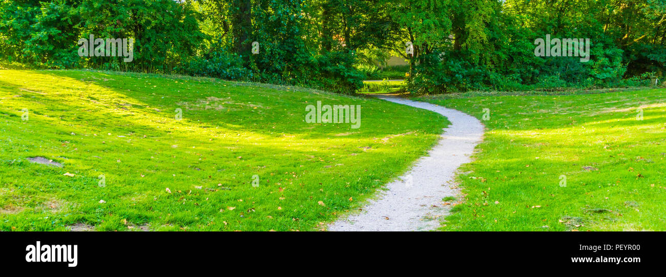 curved park road in a countryside park landscape Stock Photo - Alamy