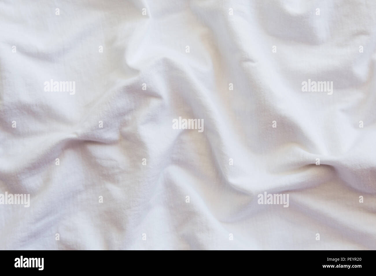Crumpled white Cotton Fabric Texture Stock Photo - Alamy