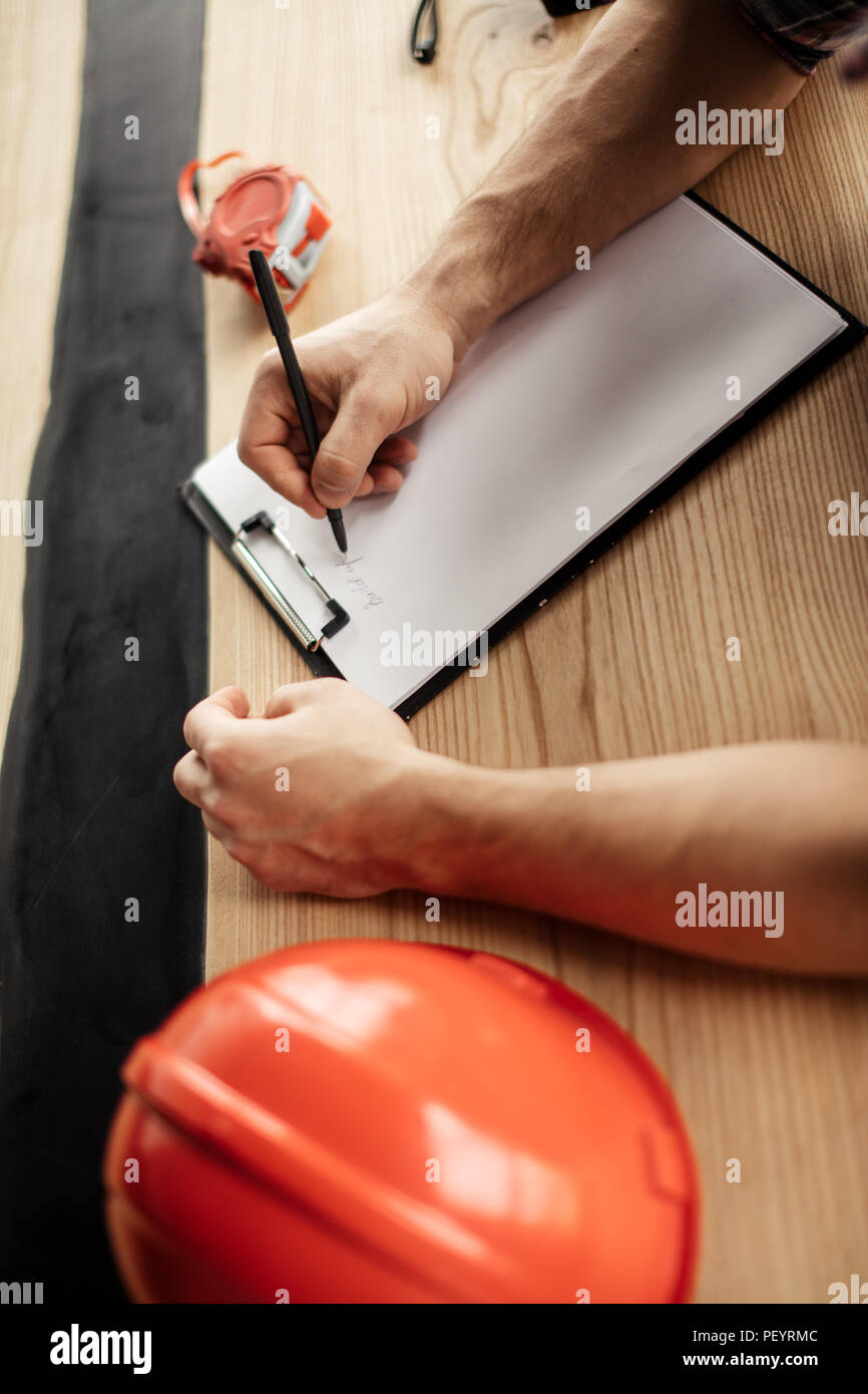 drawing concept. creation of project. paperwork. top view photo. busy ...