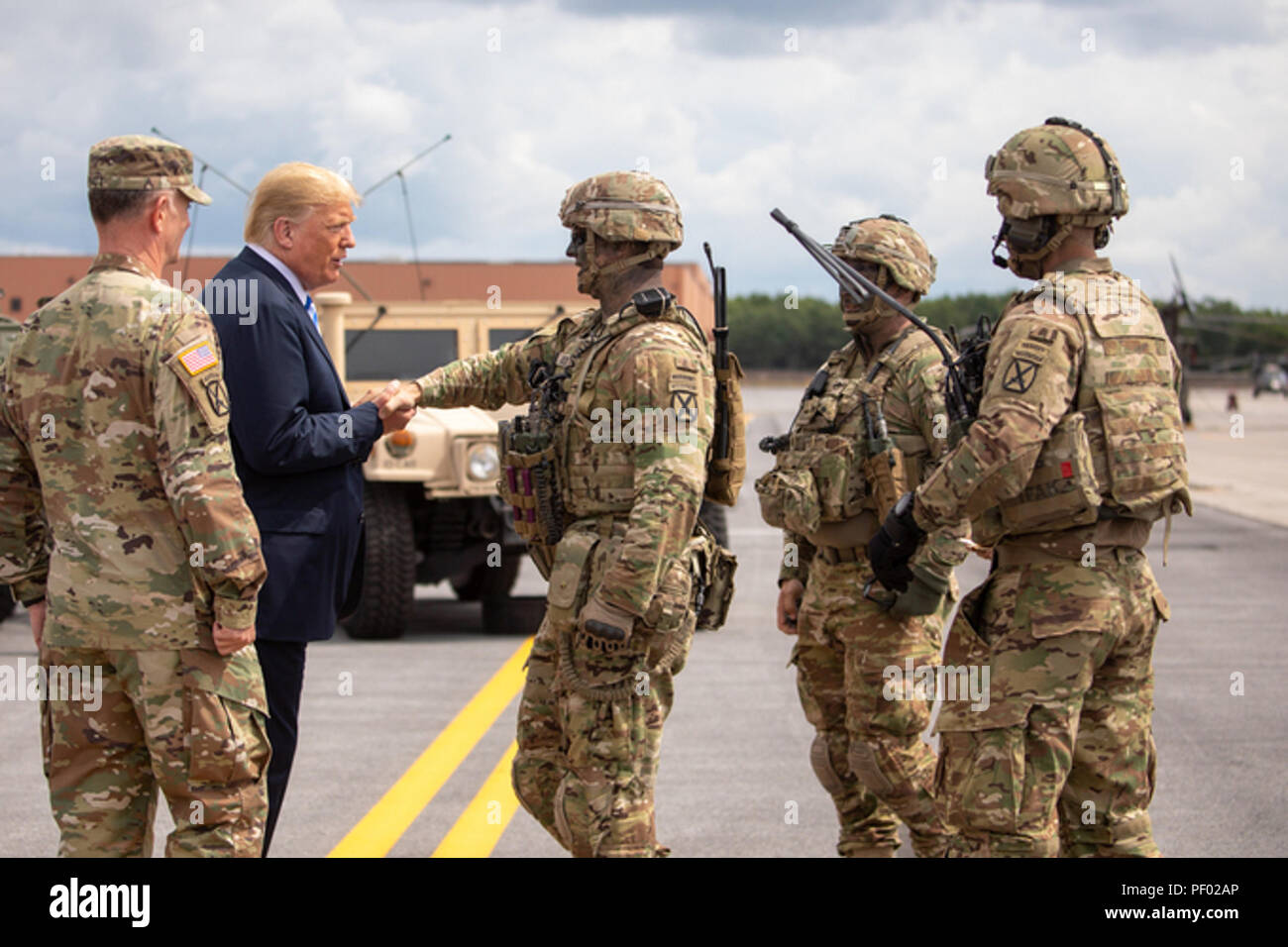 President Donald J. Trump greets U.S. Army personnel Monday, Aug. 13 ...