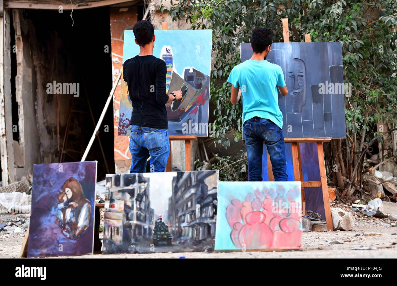 Damascus, Syria. 16th Aug, 2018. Syrian artists draw paintings amid the ...