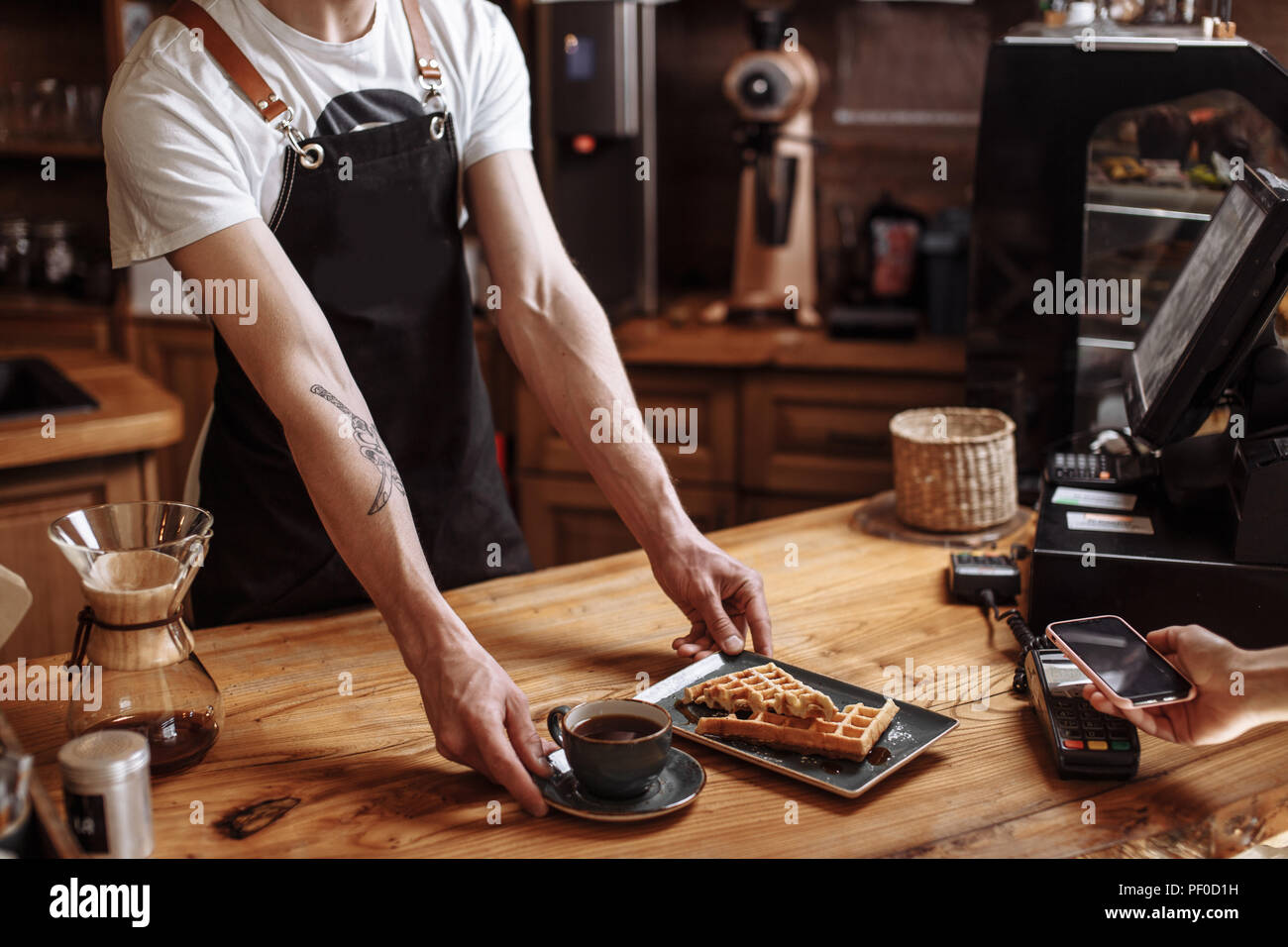 a salesman is giving the order to a client. close up cropped photo ...