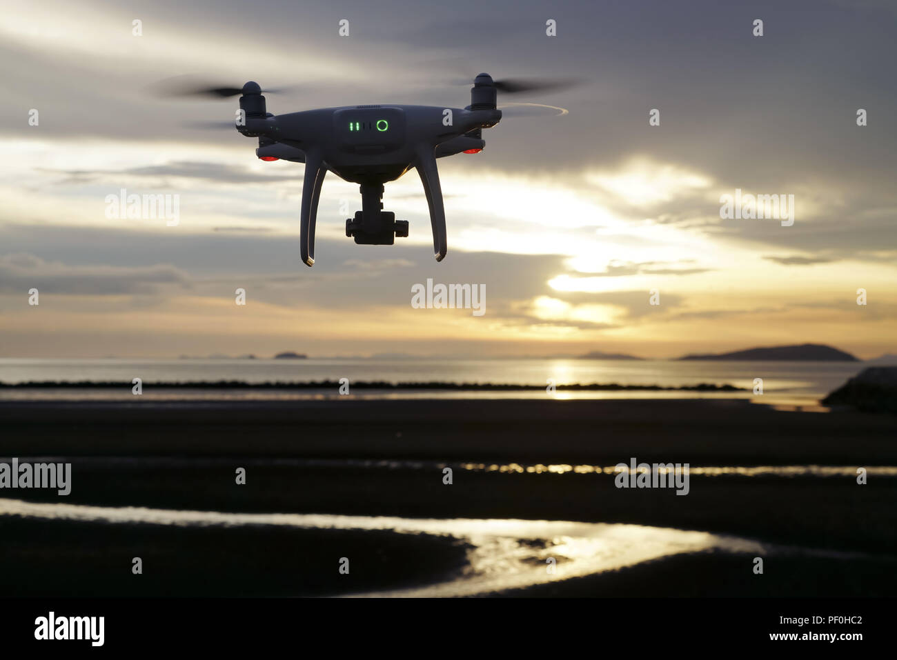 Remote controlled drone equipped with aerial photo and video hovering ...