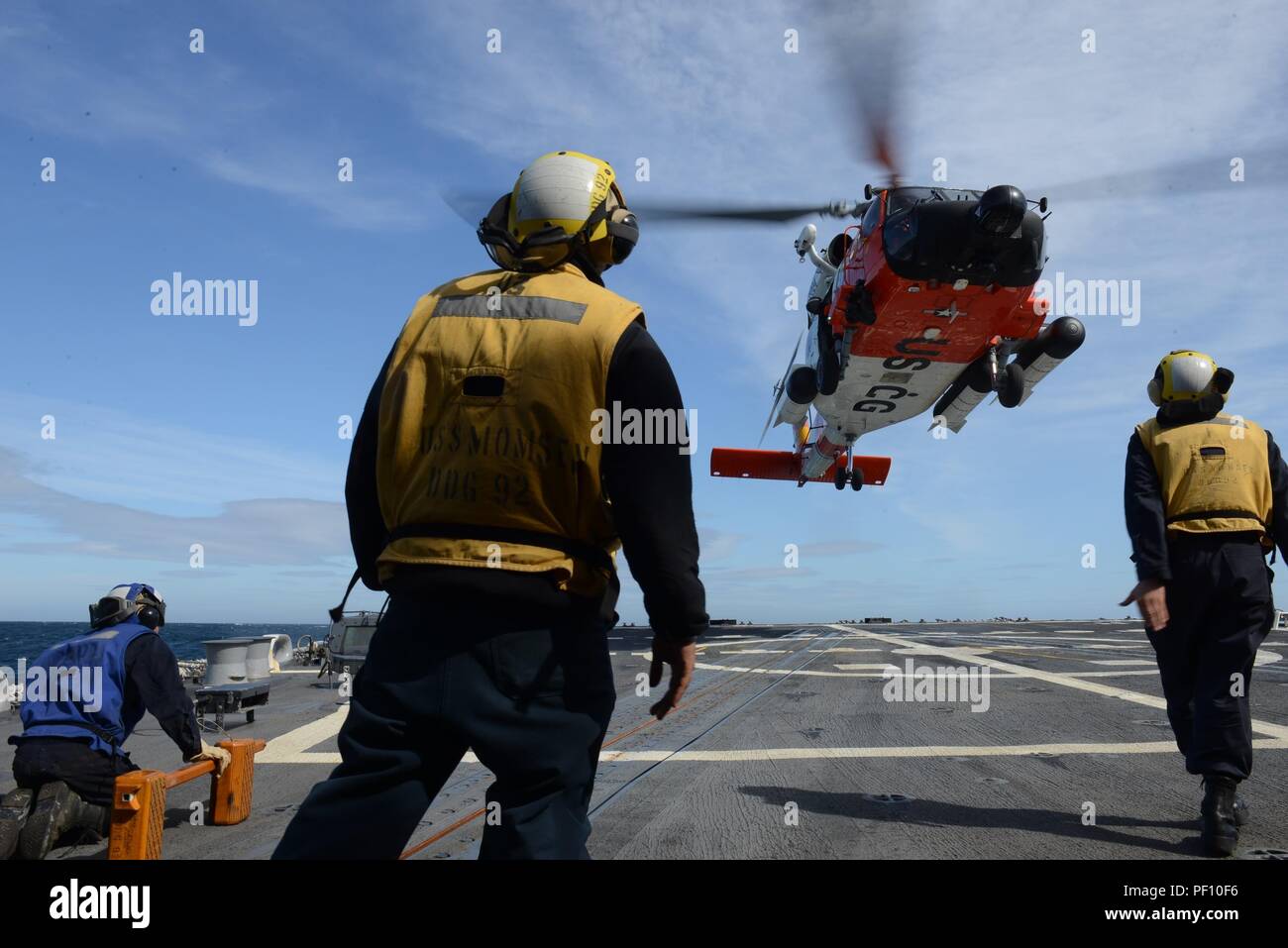 A Coast Guard MH-60 Jayhawk helicopter aircrew conducts a series of ...