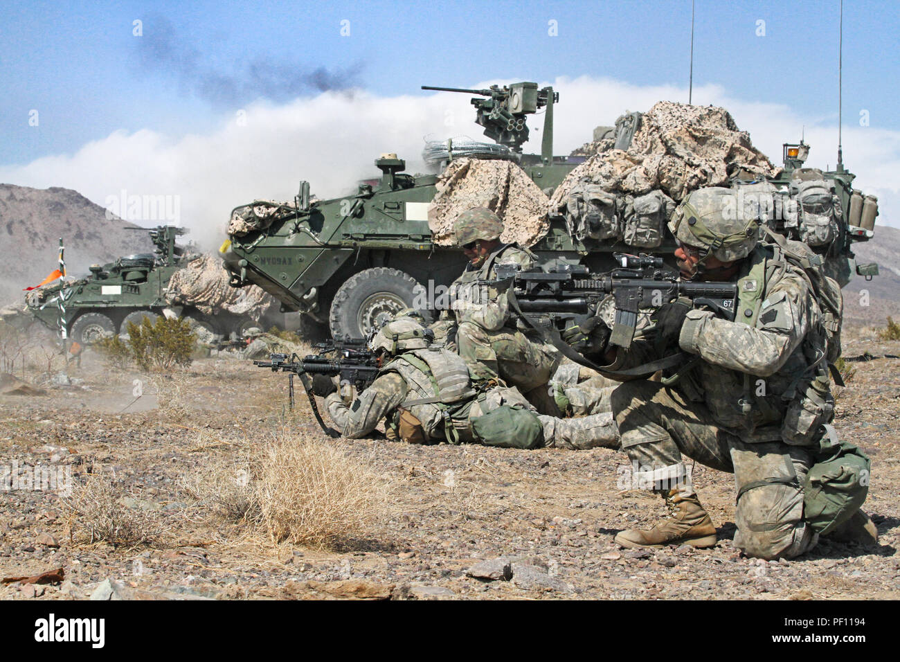 Infantrymen and Stryker crewmembers with Alpha Company, 2nd Battalion ...