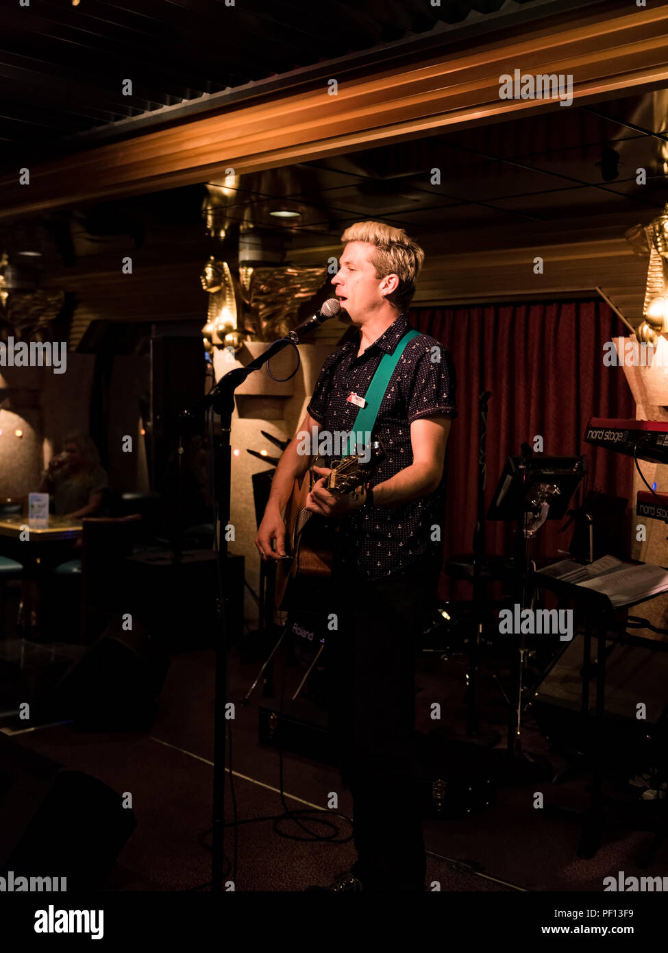 its singer working so hard for ever customer in carnival immigration ...