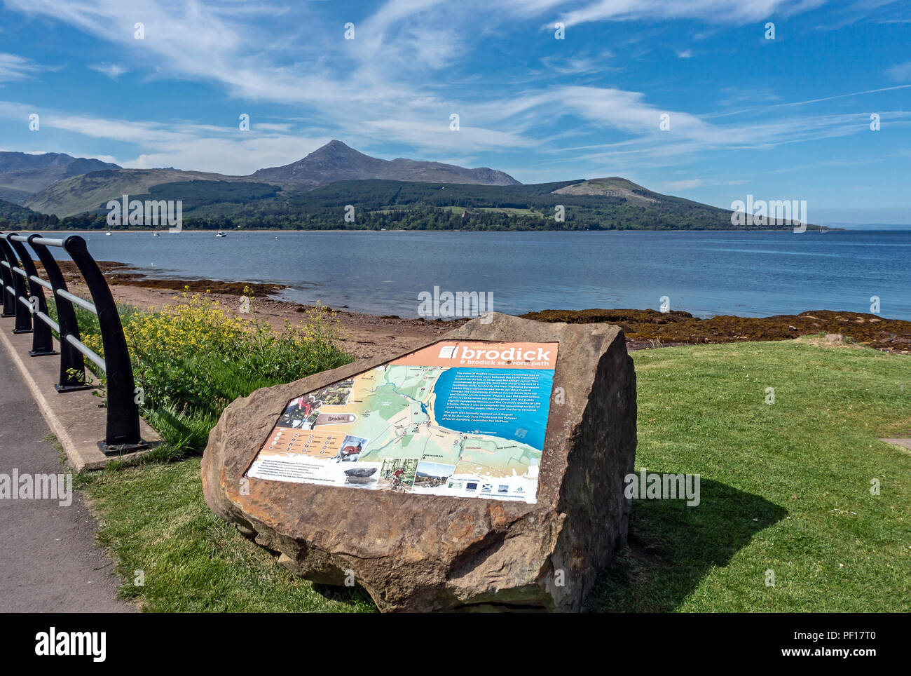 Stone with interpretation panel inserted at the beach at Brodick Isle ...